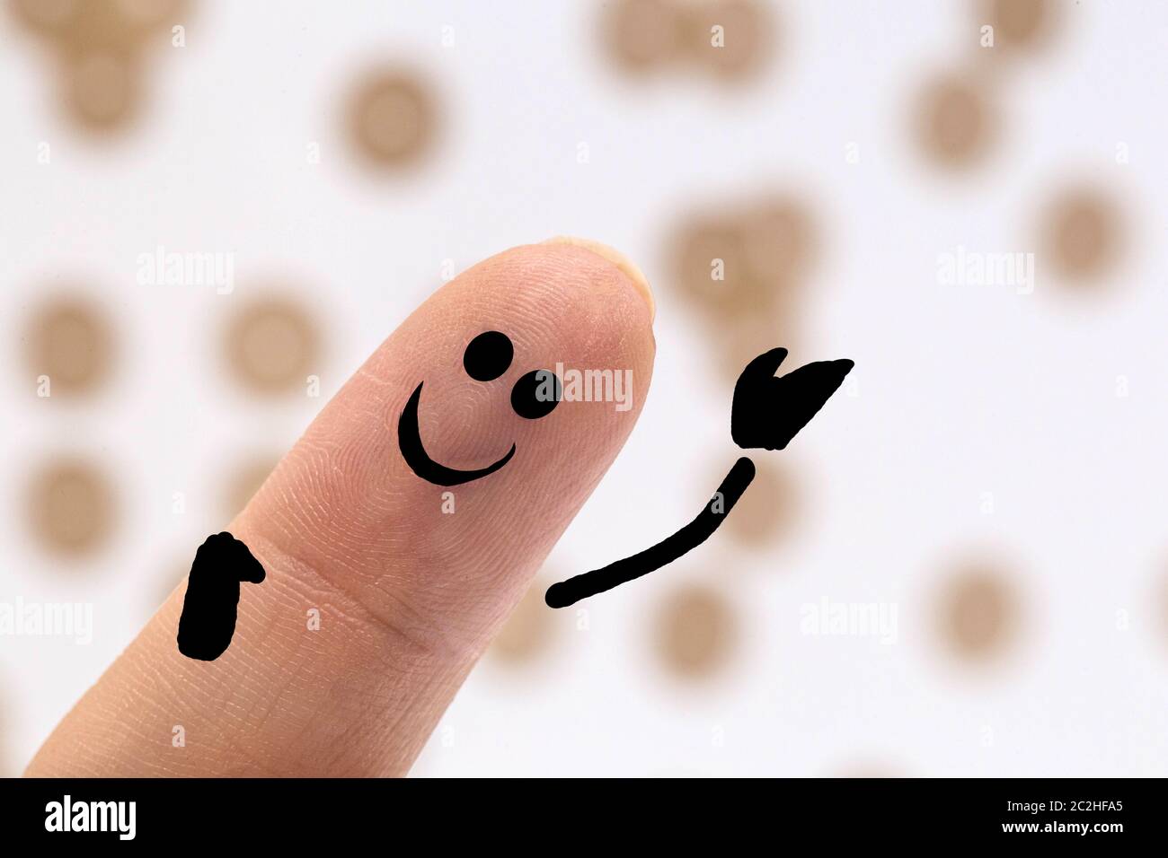 Finger smiley waving isolated with bokeh background , happy fun painted ...