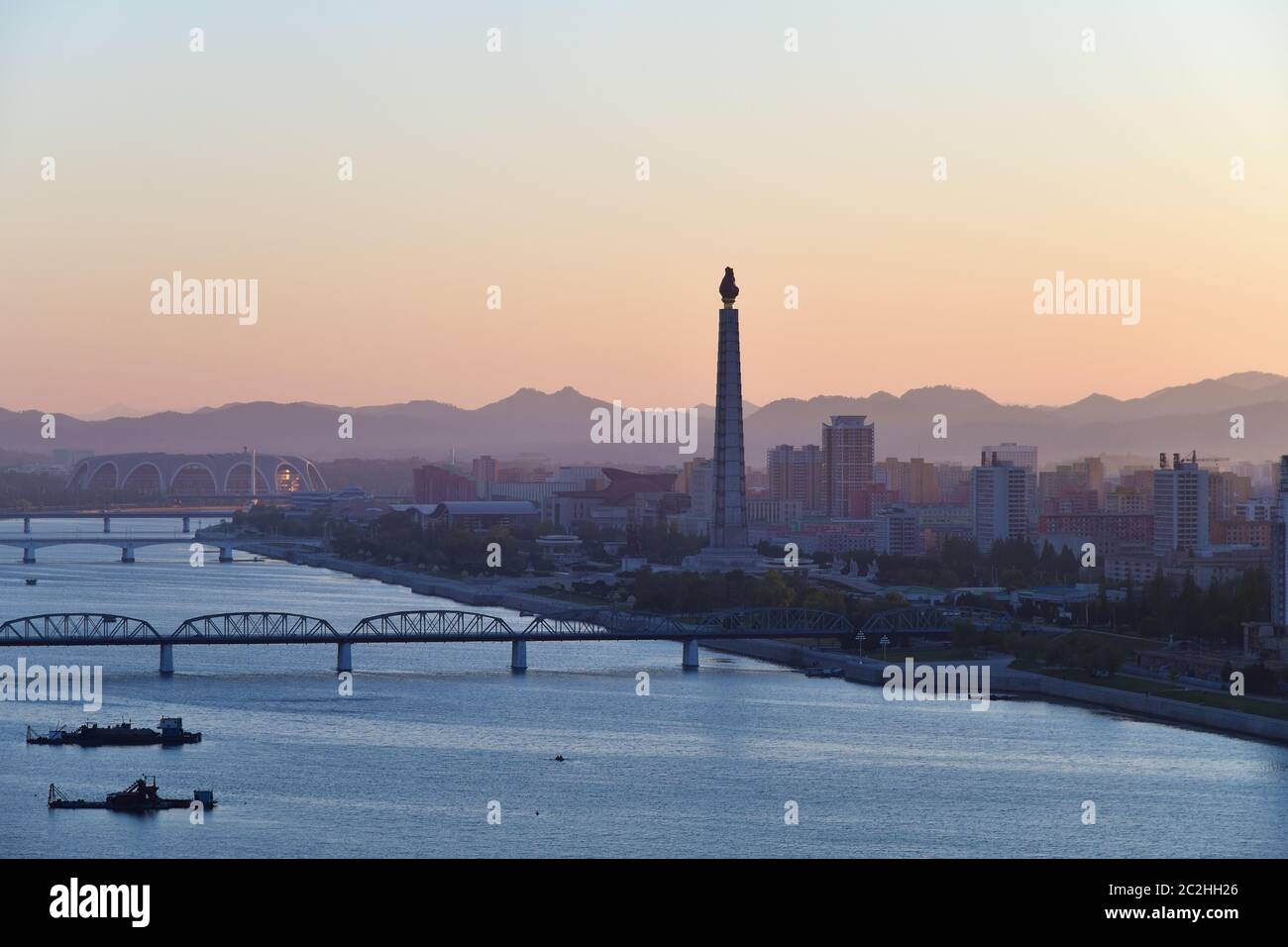 Sunrise in Pyongyang, North Korea and Taedong River in the morning fog ...