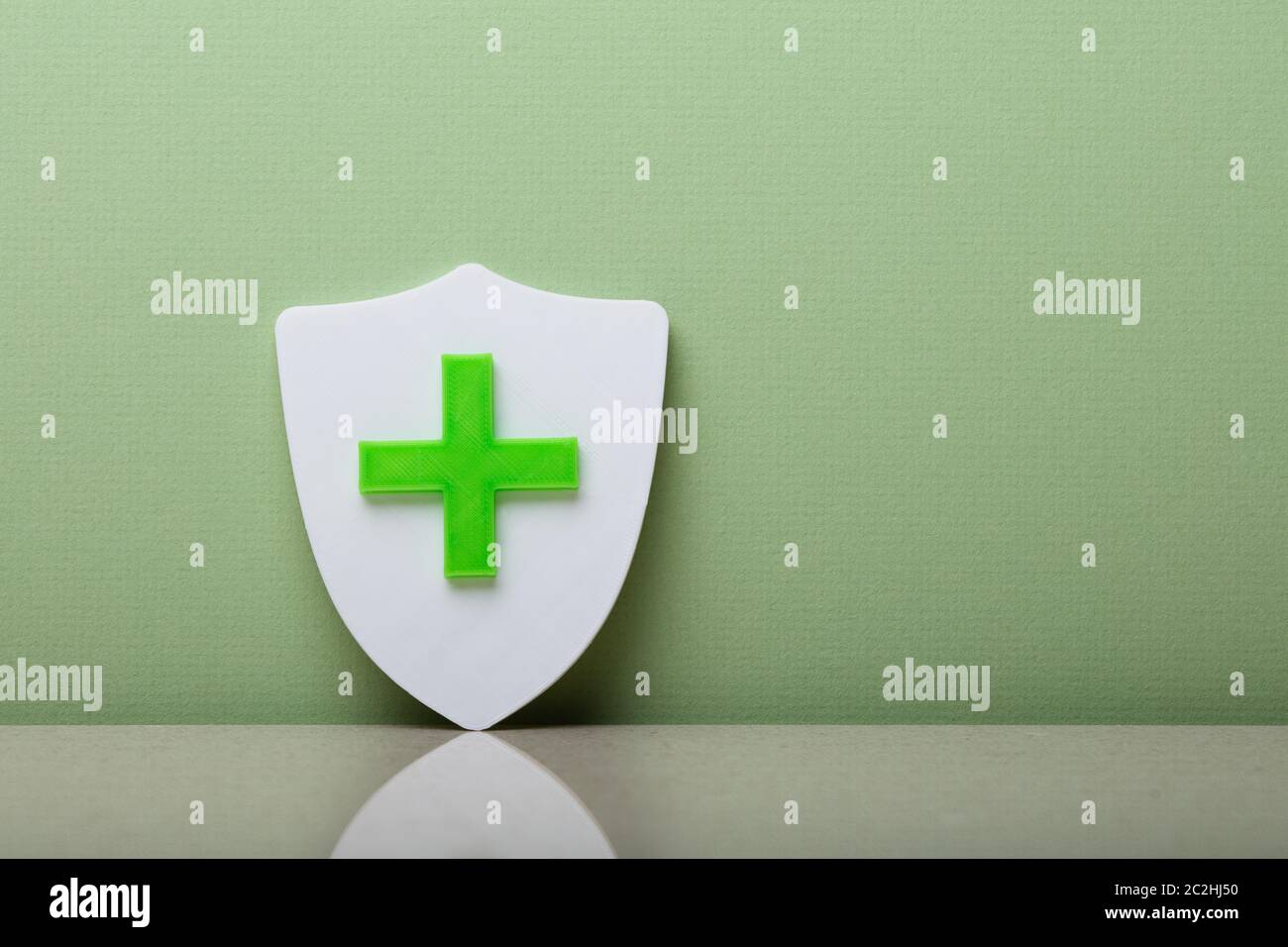 Plus symbol wall shadow hi-res stock photography and images - Alamy