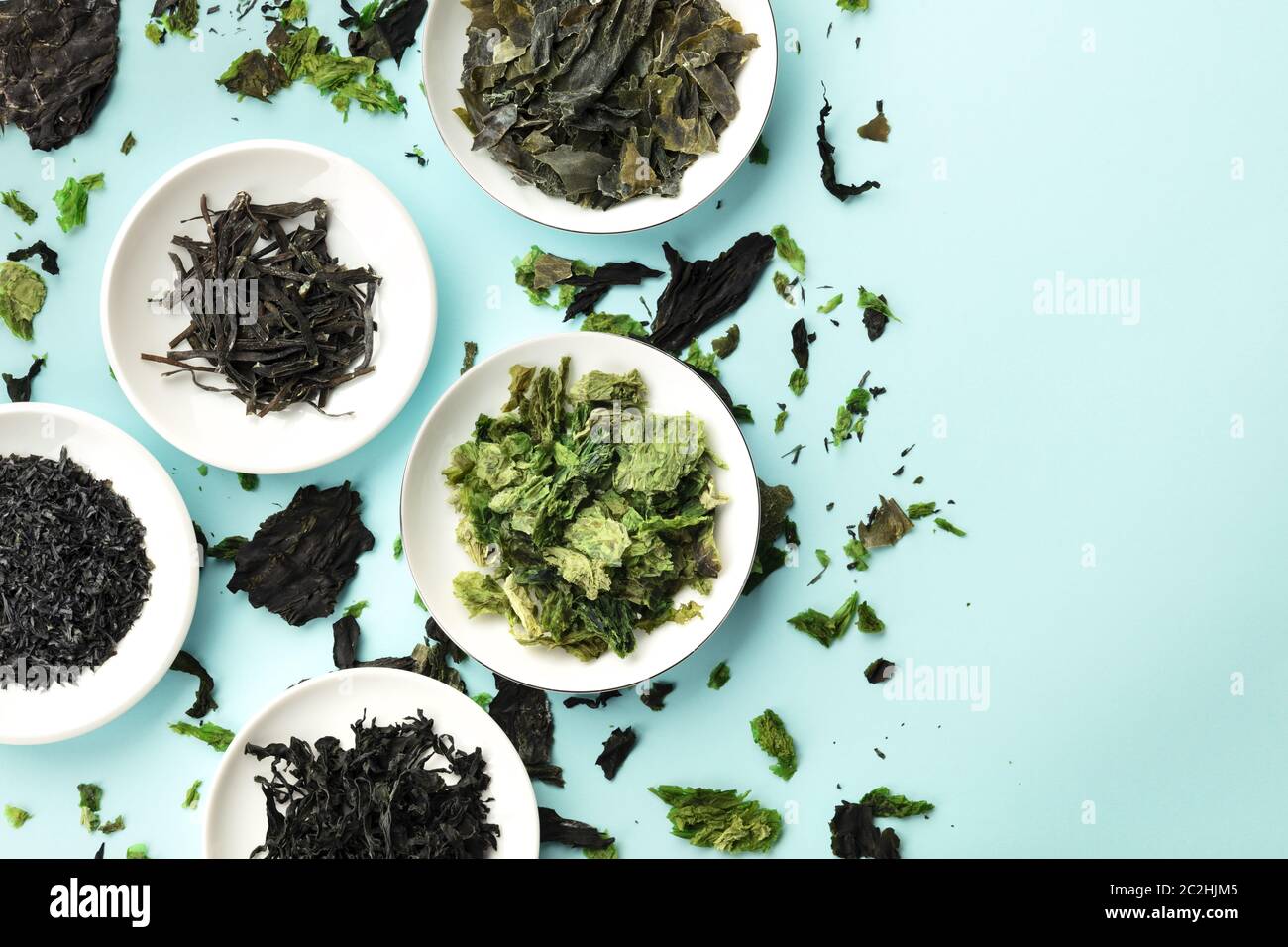 Dry seaweed, sea vegetables, top shot on a light blue background with a ...