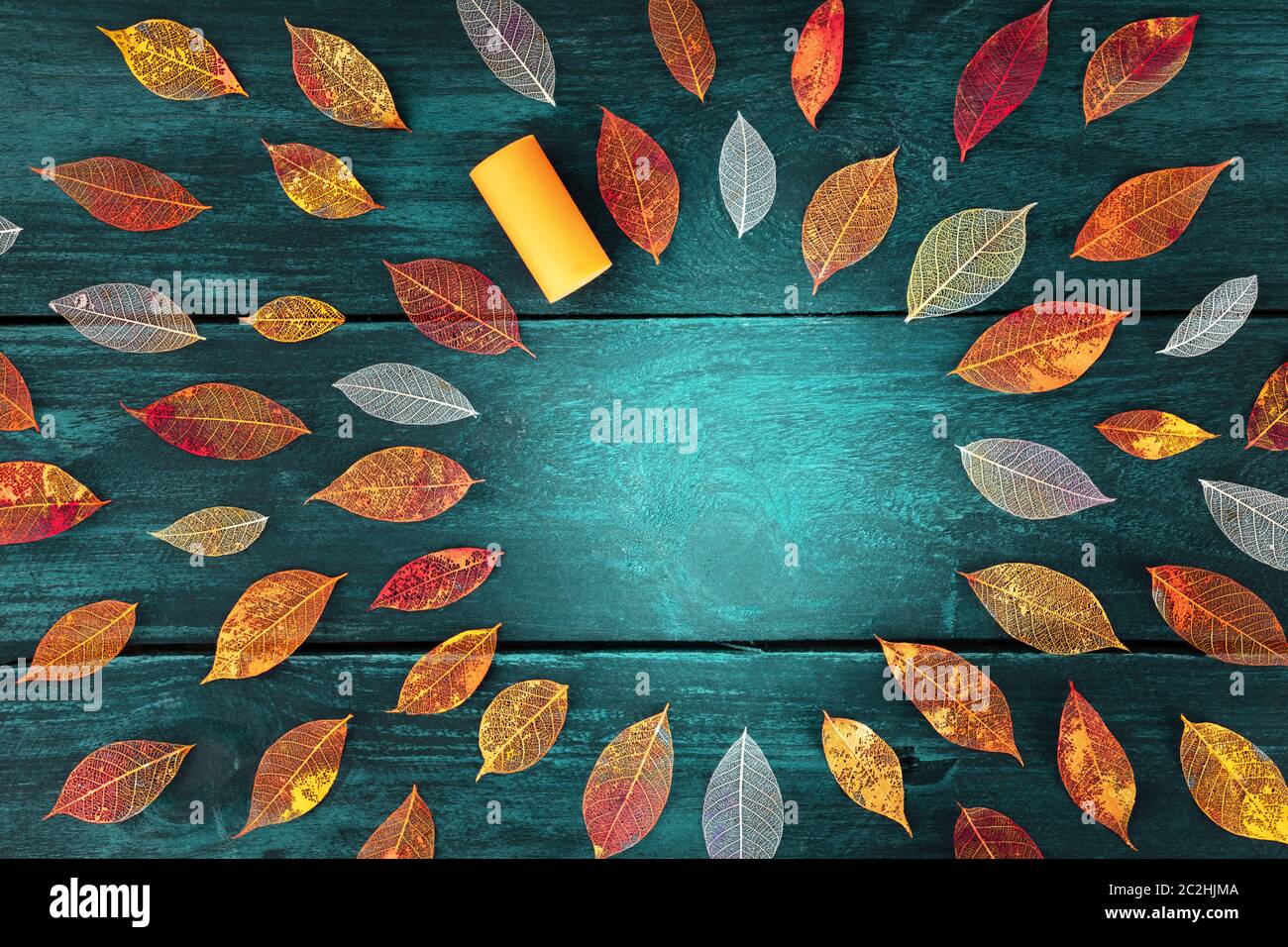 Autumn wine tasting invitation. Vibrant fall leaves on a dark wooden ...