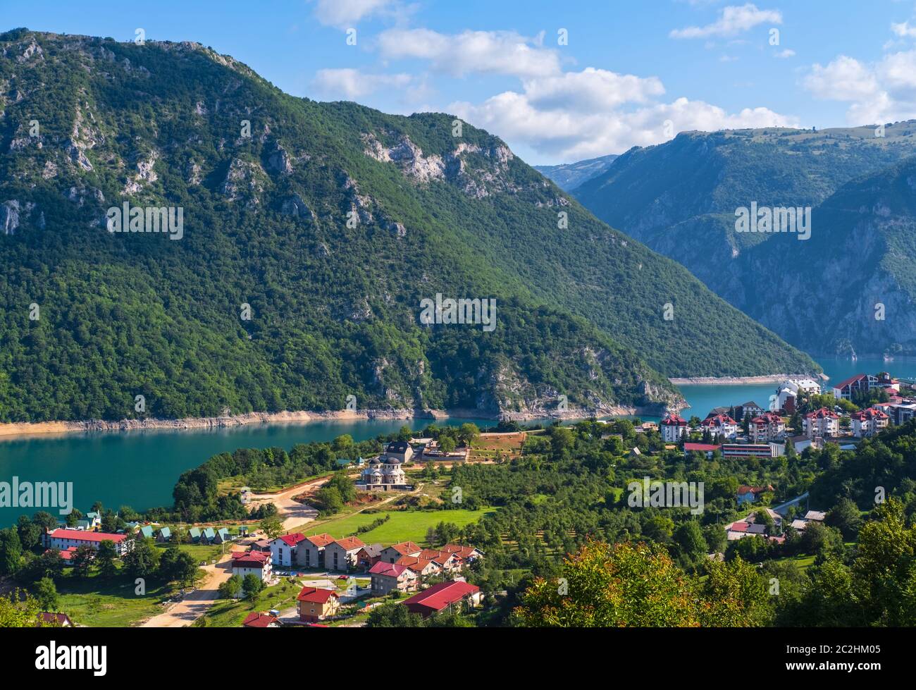 Piva Lake (Pivsko Jezero) and Pluzine town view in Montenegro Stock ...
