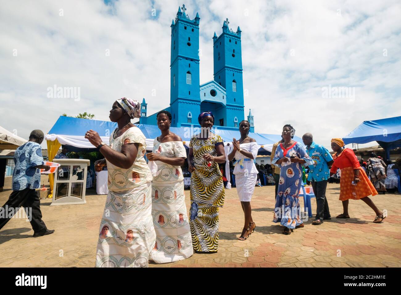 Catholic Sunday service, women in festive robes dance during Sunday ...