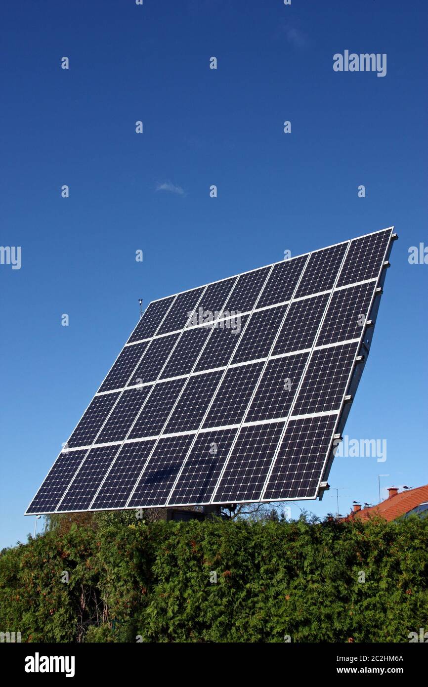 Solar panels with tracking system, alternative energy Stock Photo - Alamy