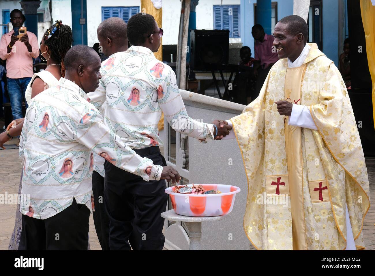 Catholic priest thanks for the collections (donation of money) of the ...
