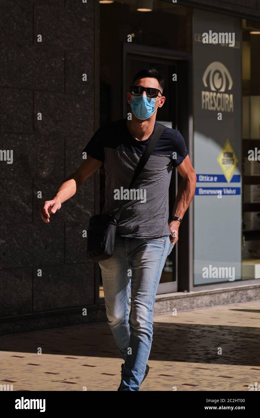 Young boy walking medical protection face mask covid-19 infection ...