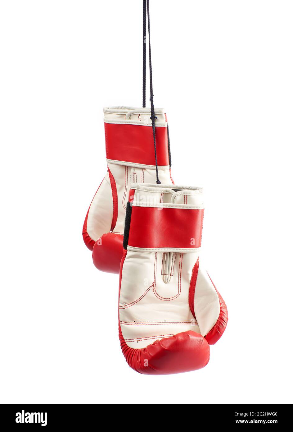 pair of red leather boxing gloves hanging on a black rope, object ...