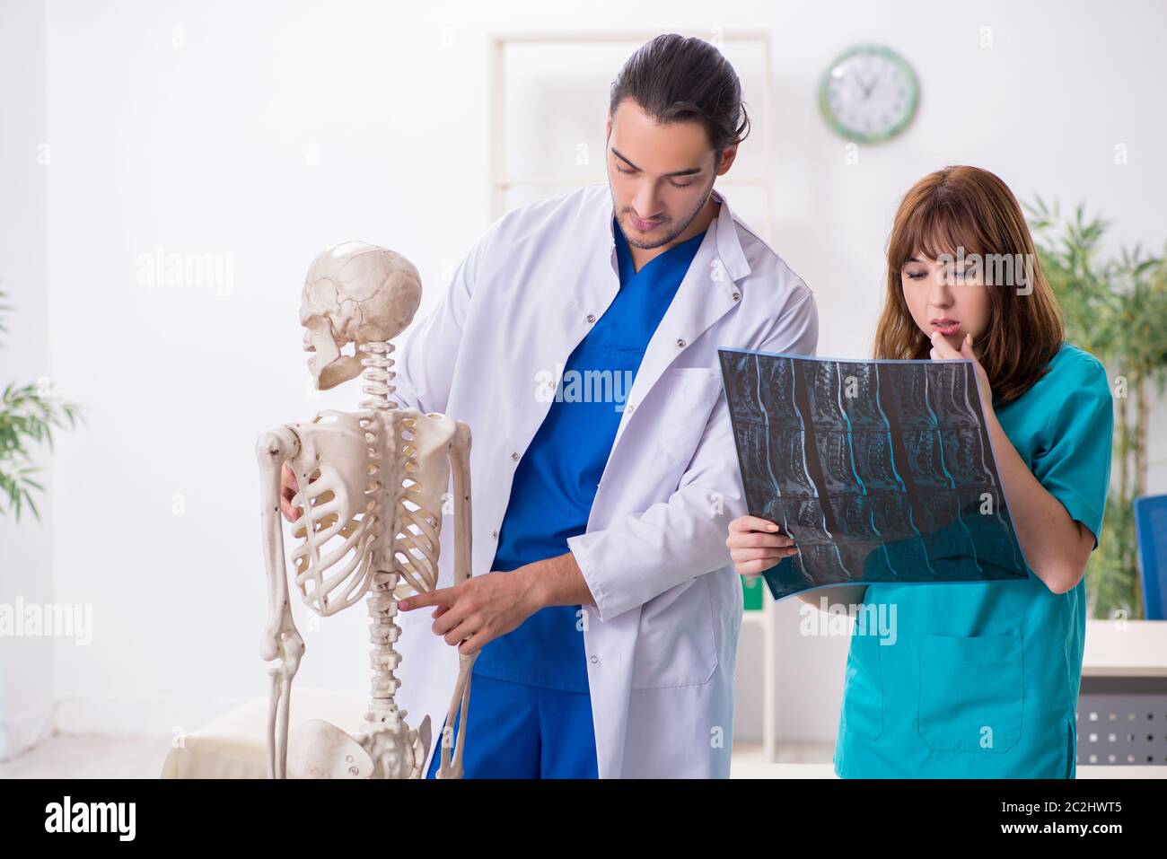 Two doctors colleagues working in hospital Stock Photo - Alamy