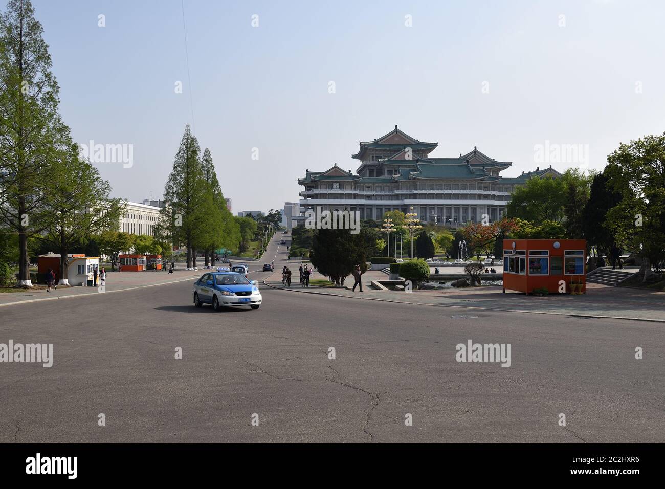 Pyongyang, North Korea - April 29, 2019: Local people shown on a city ...
