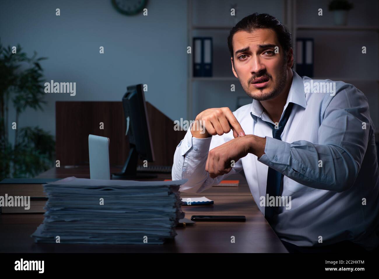 Checking laptop night time hi-res stock photography and images - Alamy