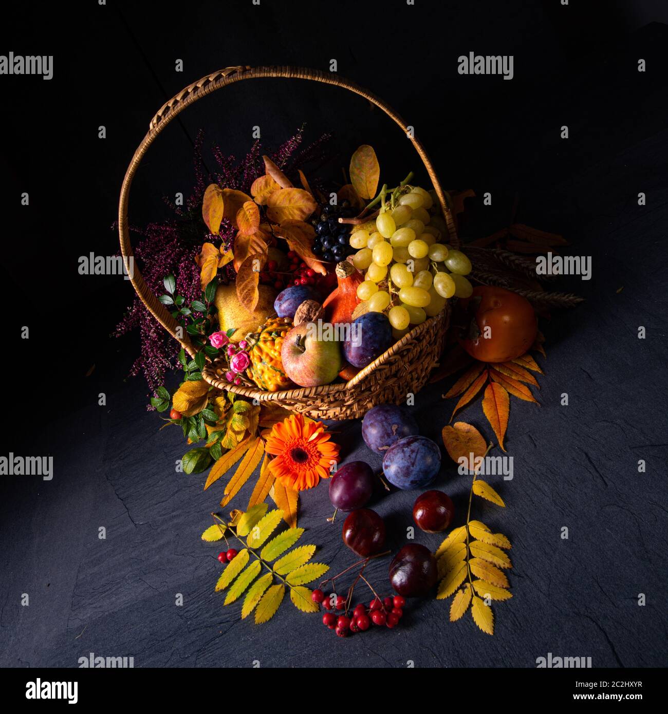 autumnal cornucopia in round basket Stock Photo - Alamy