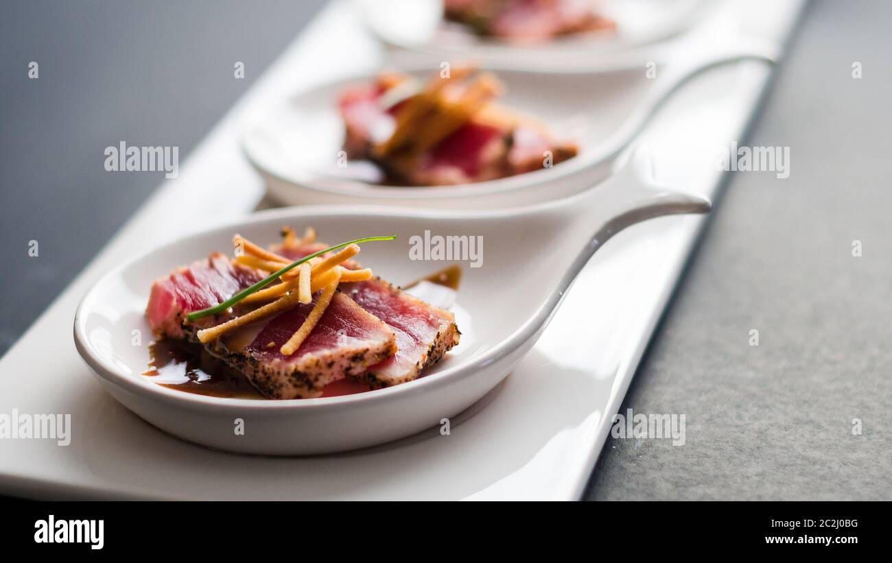 Tuna Tataki is a Japanese dish which consist of briefly seared tuna ...