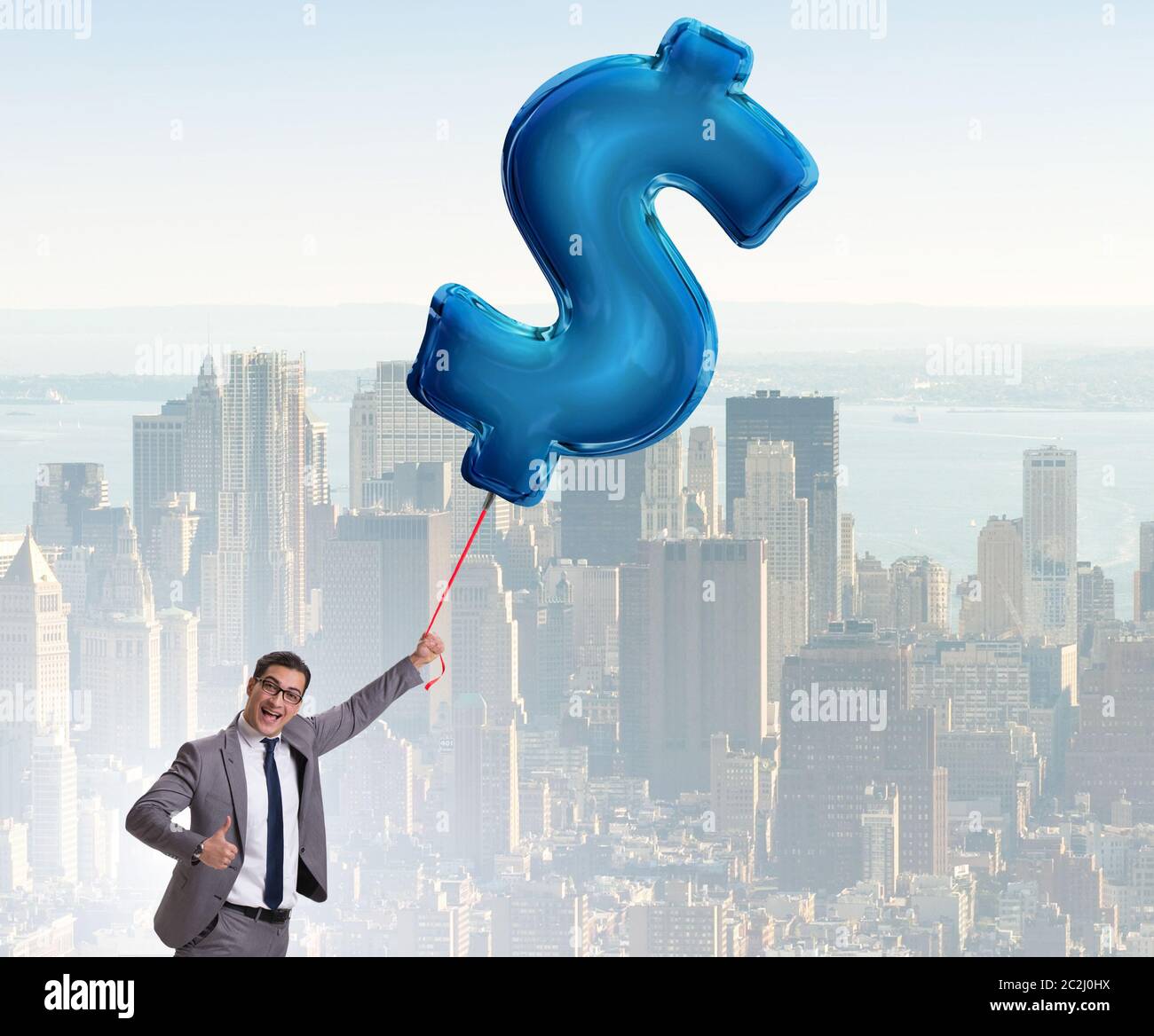 The businessman flying on dollar sign inflatable balloon Stock Photo ...