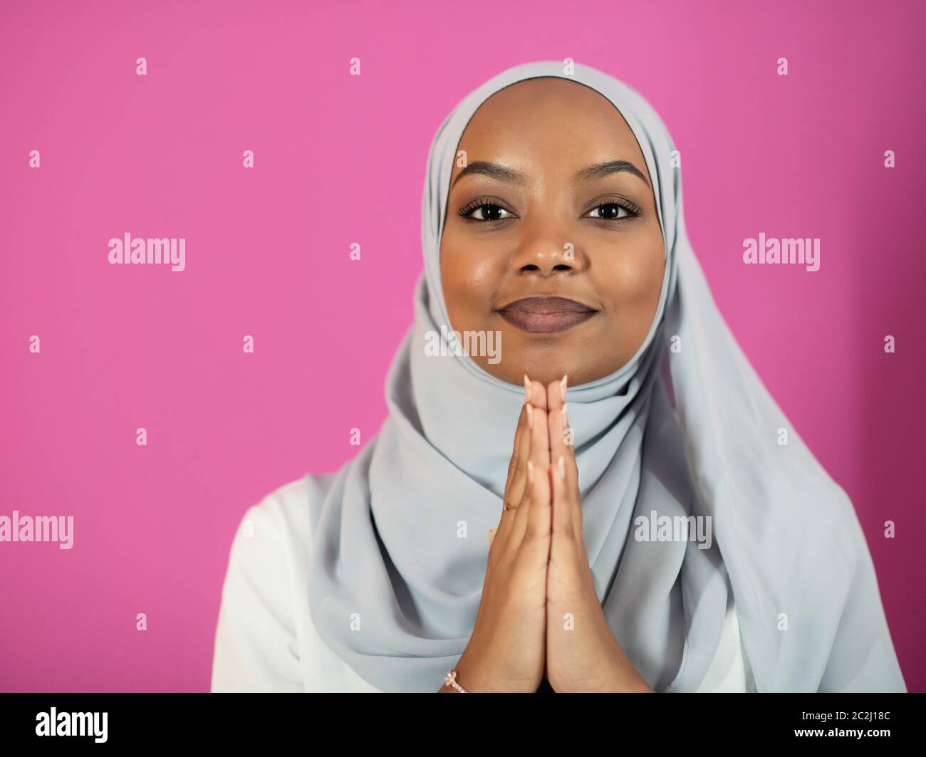 African Muslim woman makes traditional prayer to God Stock Photo - Alamy