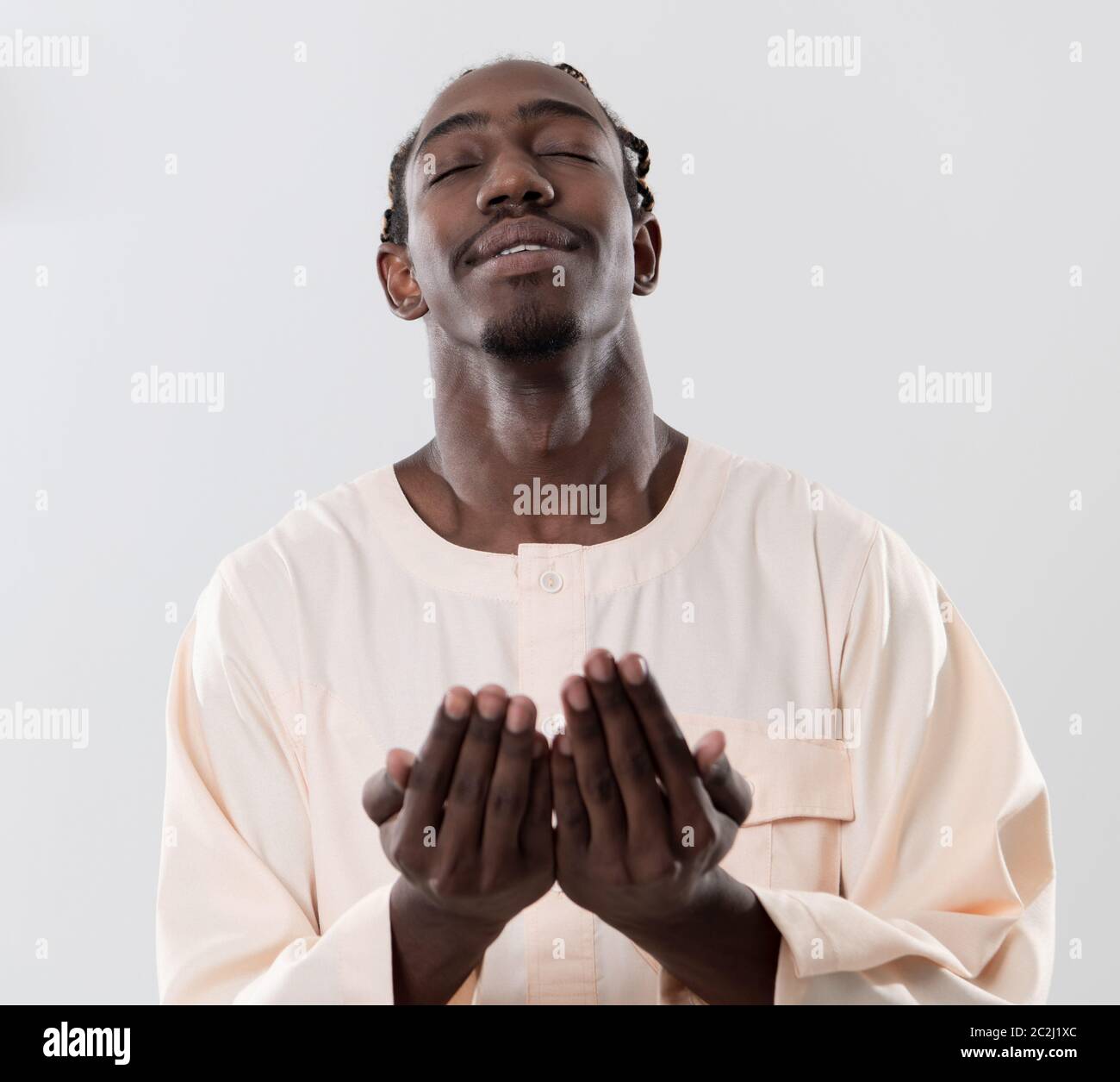 African muslim man praying god hi-res stock photography and images - Alamy