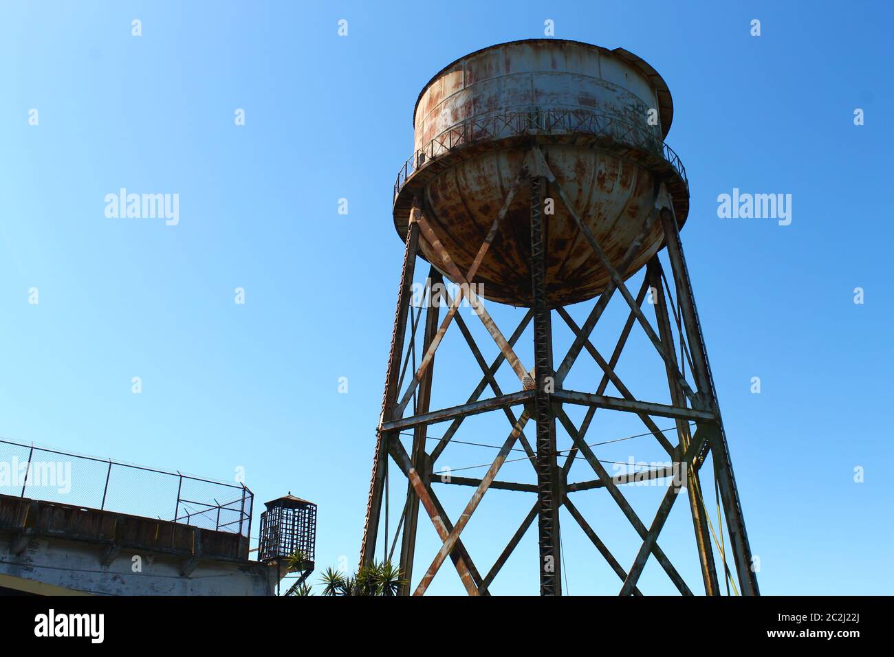 The rust water tower of Alcatraz island Stock Photo - Alamy