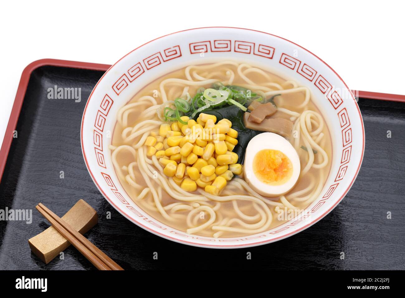 Japanese Miso ramen noodles with chopsticks on black tray Stock Photo ...