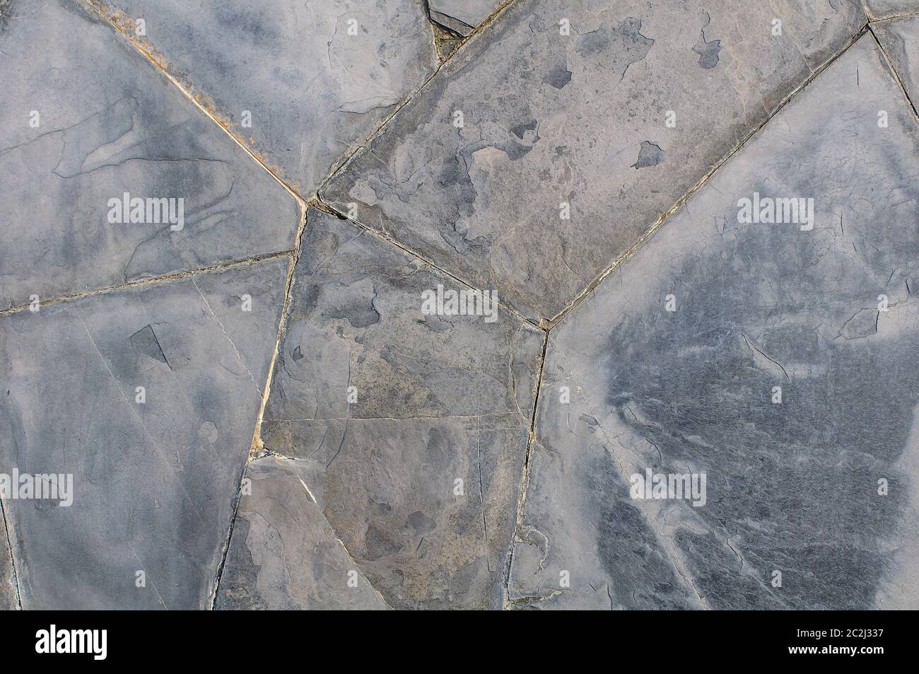 Stone wall background Wall made of cavern rock Stock Photo - Alamy
