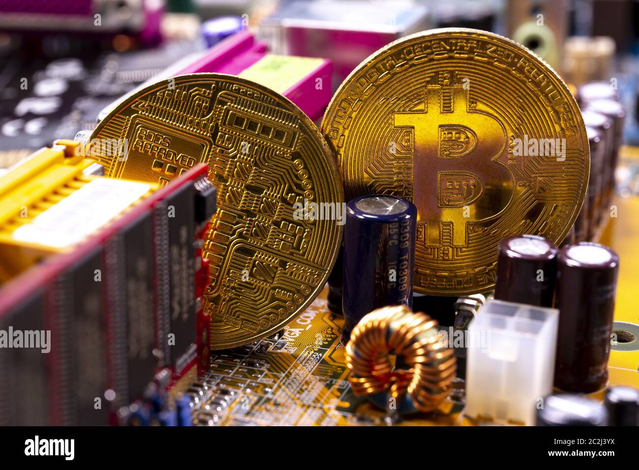 Bitcoin coins and printed circuit board PCB Stock Photo - Alamy