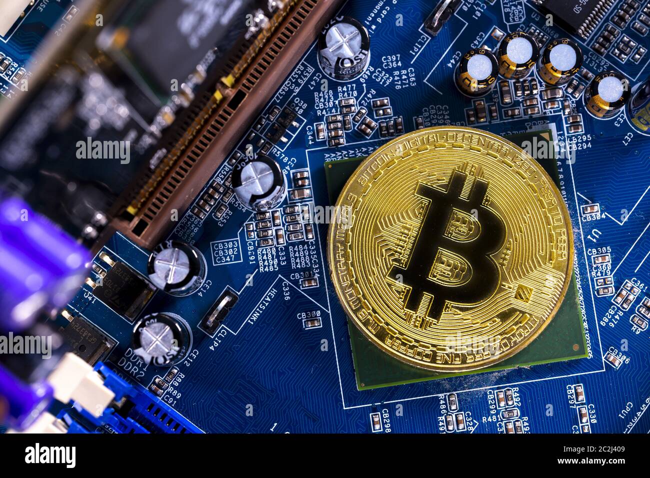 Bitcoin coin and printed circuit board PCB Stock Photo - Alamy