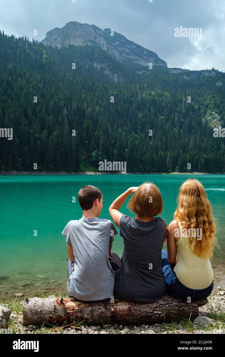 Family on Black lake, Montenegro Stock Photo - Alamy