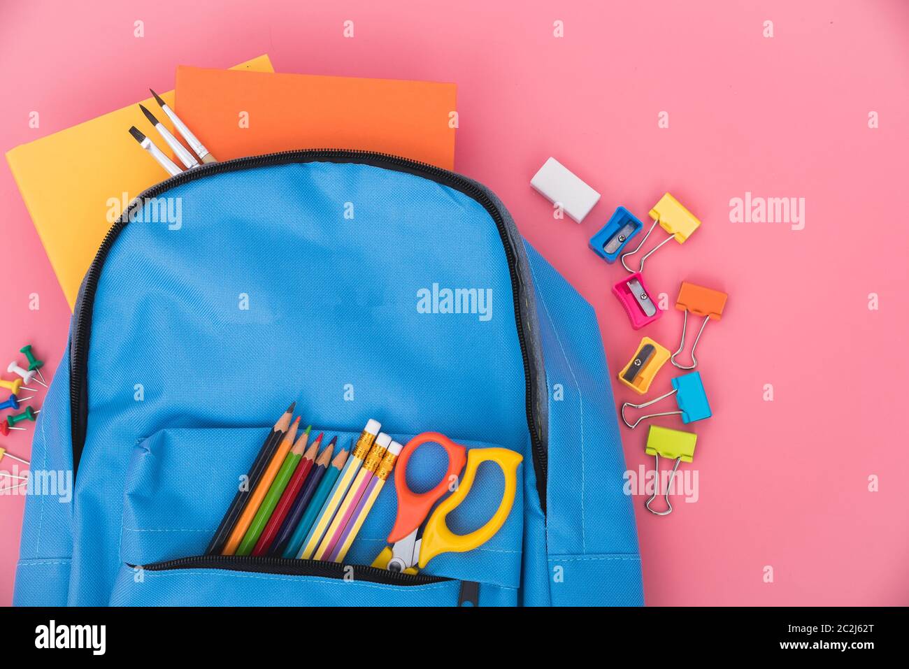Blue bag backpack for education children on pink background back to ...