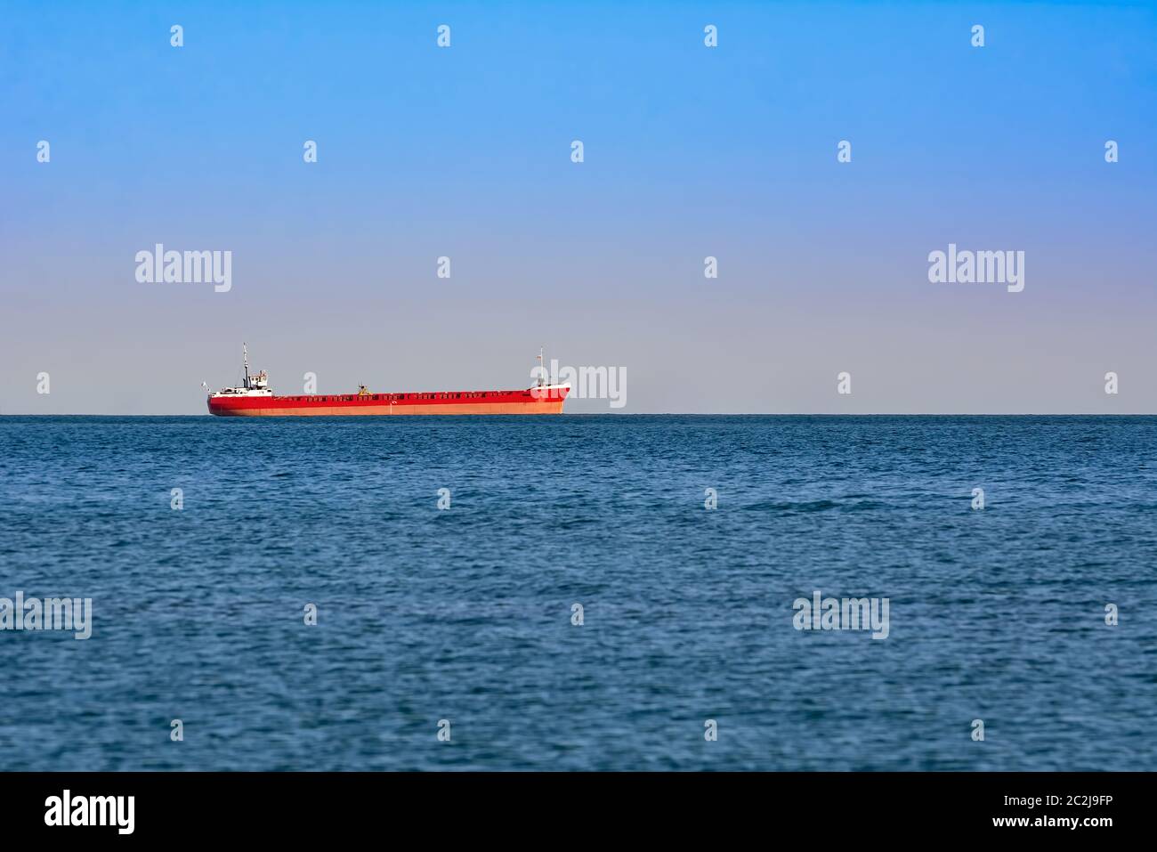 Cargo Ship in the Sea Stock Photo - Alamy