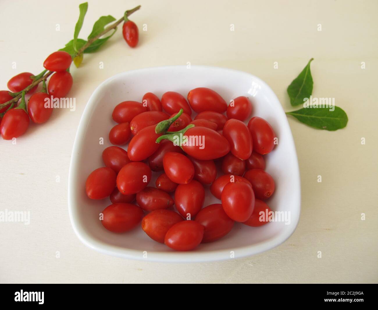 Red goji berry, wolfberry in a bowl Stock Photo - Alamy