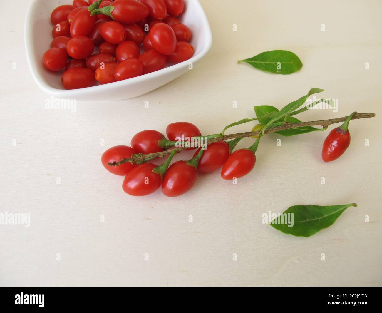 Red goji berry, wolfberry in a bowl Stock Photo - Alamy