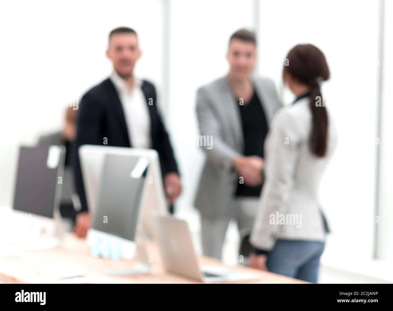 blurry image of employees at their workplace in the office Stock Photo ...