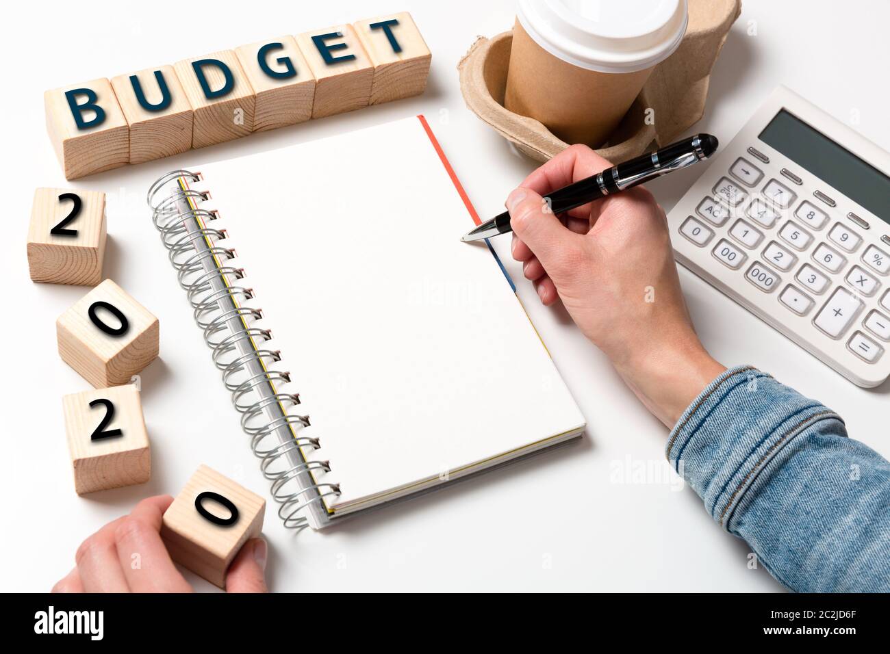 Budget planning for 2020. Office workplace table with calculator, pen ...