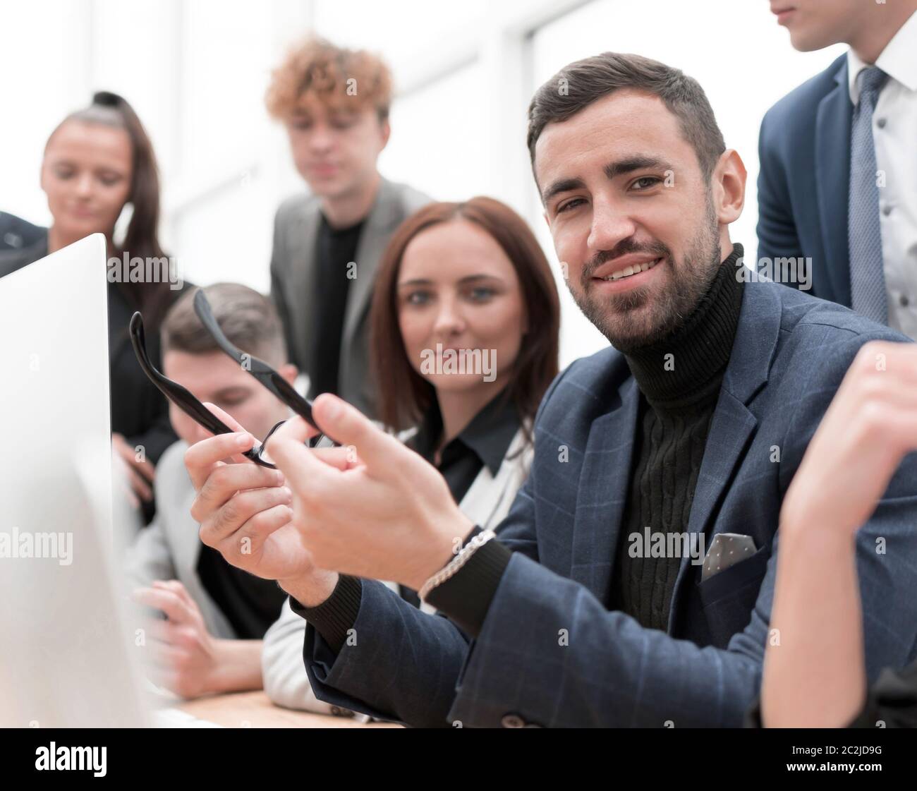 project Manager and business team sitting at the Desk Stock Photo - Alamy