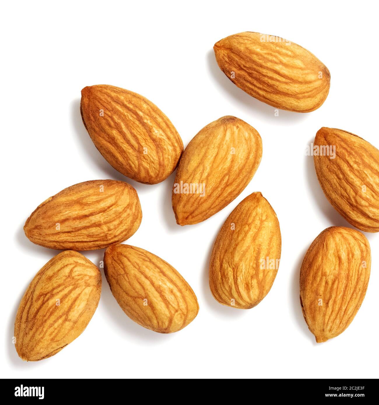 Nuts almonds scattered on a white background. Isolated with shadow ...