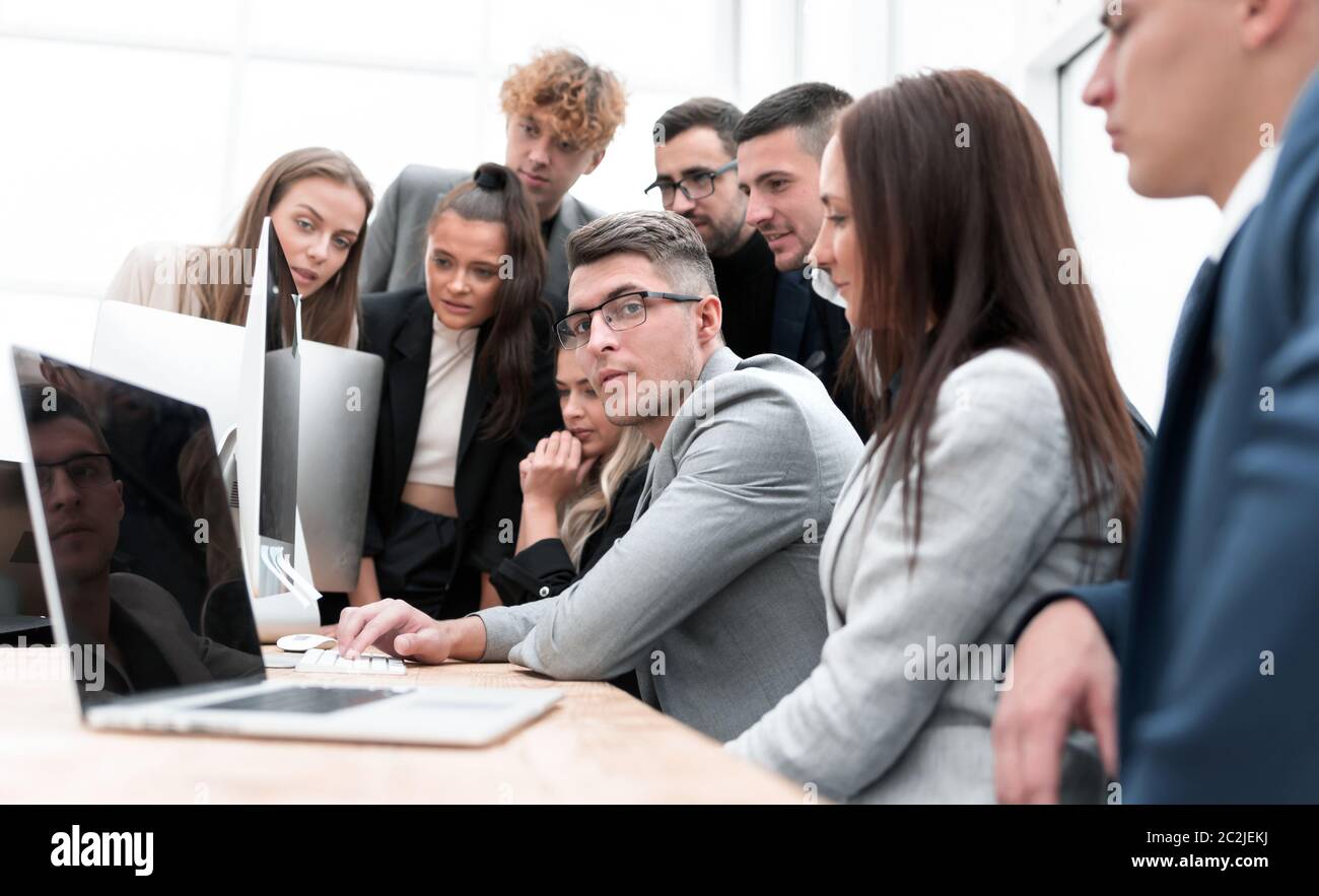project Manager and business team discussing new information Stock ...
