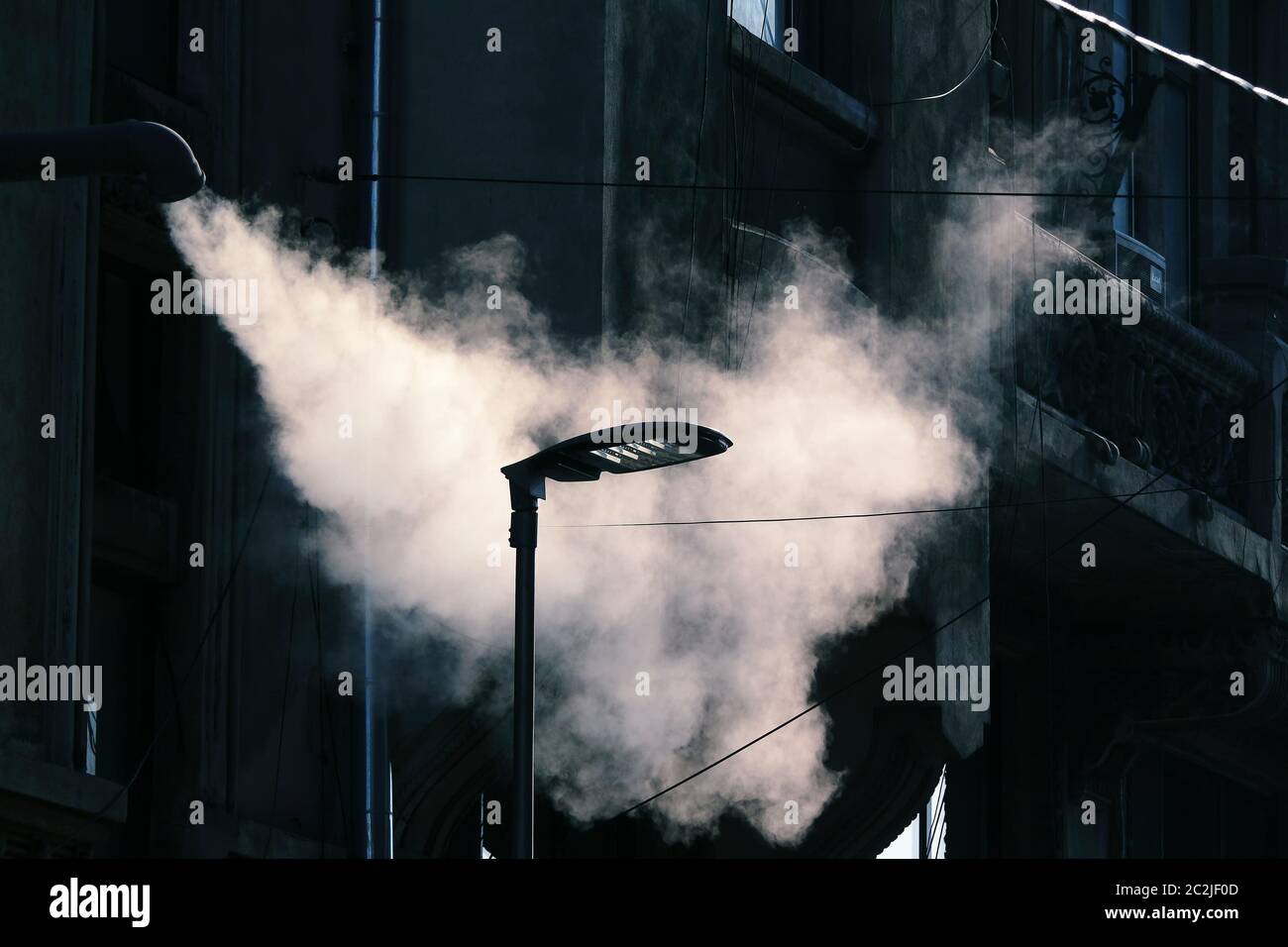 Bucharest, Romania - October 10, 2018: Steam emerges from a pipe of a ...
