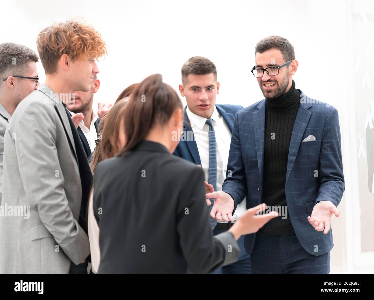 group of employees enthusiastically discussing new ideas Stock Photo ... group of employees enthusiastically discussing new ideas Stock Photo ...
