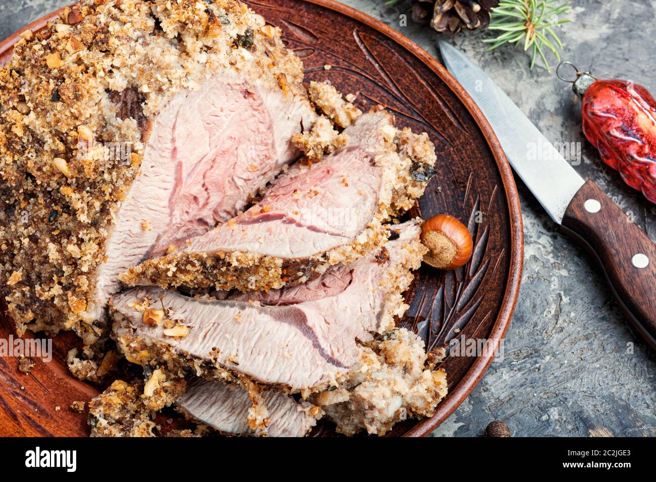 Baked meat under a bread crust.Roasted beef Stock Photo - Alamy
