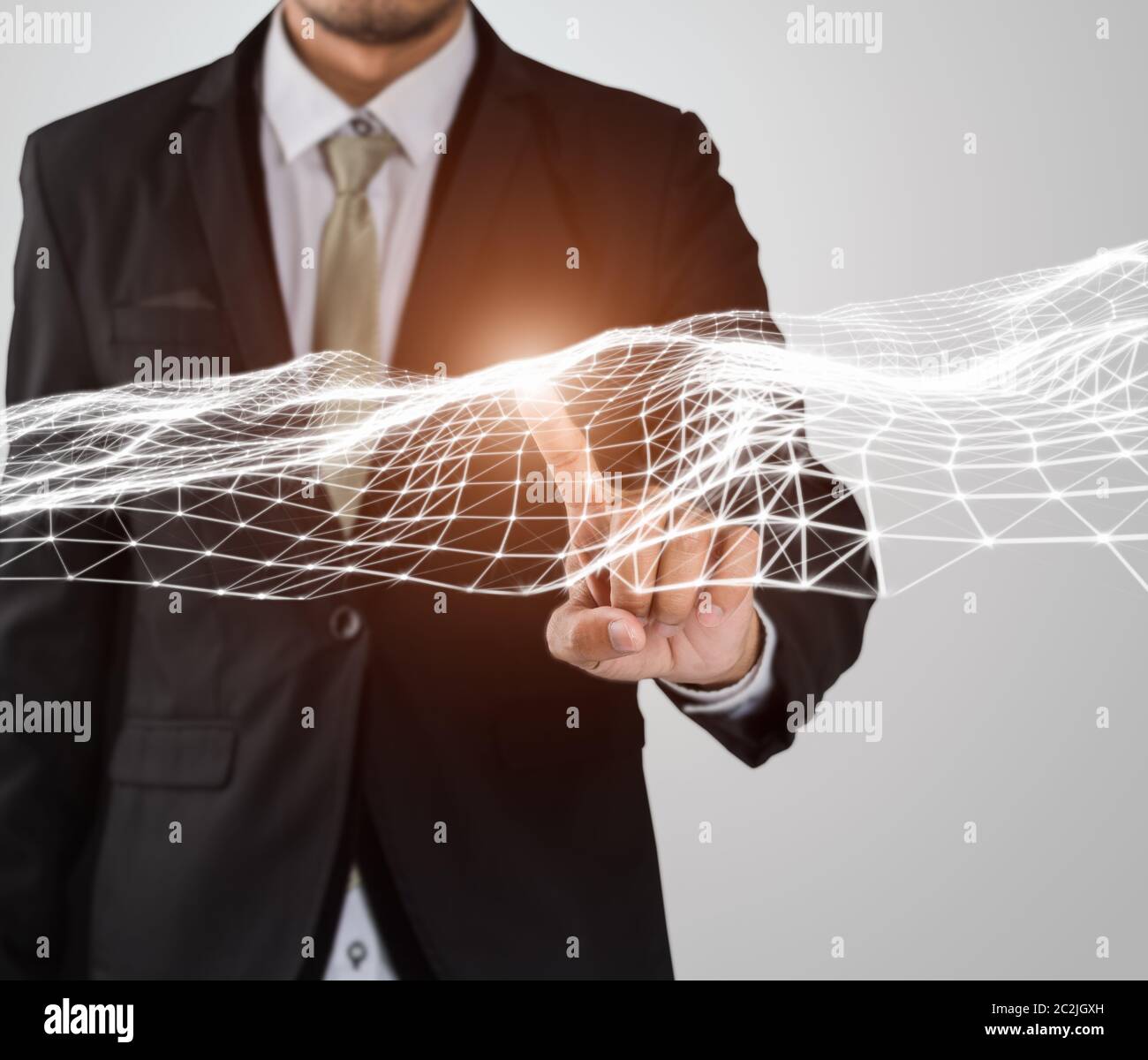 Businessman finger touching flying network connection with copy space ...