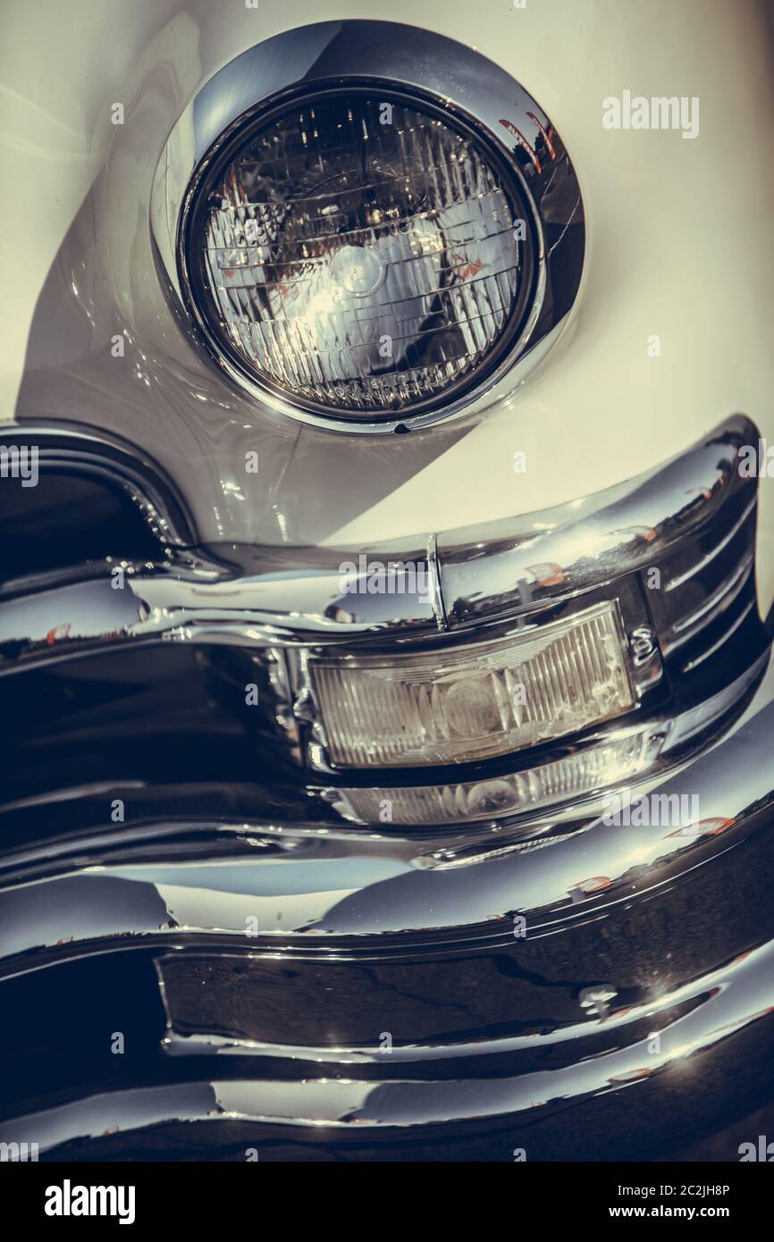 Close up vertical image of the headlight of a vintage classic car Stock ...