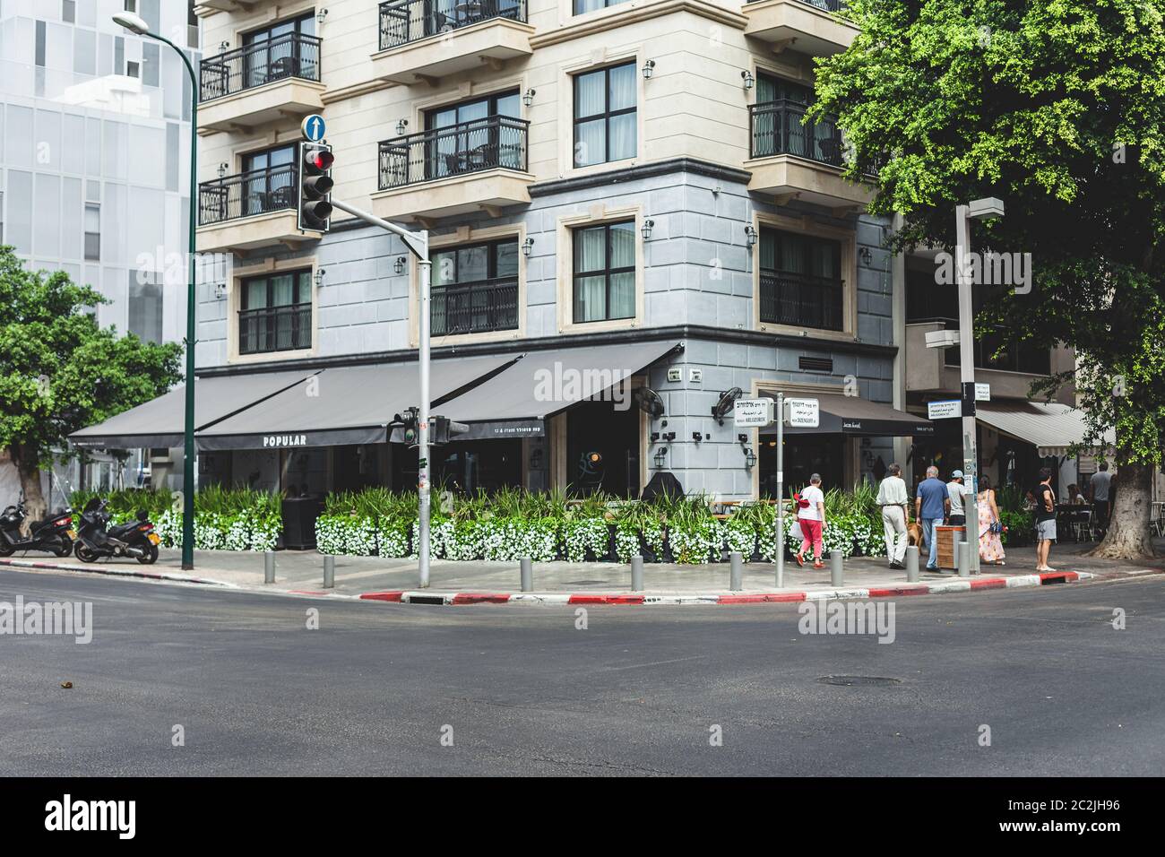 Tel Aviv/Israel-9/10/18: people walking past Cafe Popular located in ...