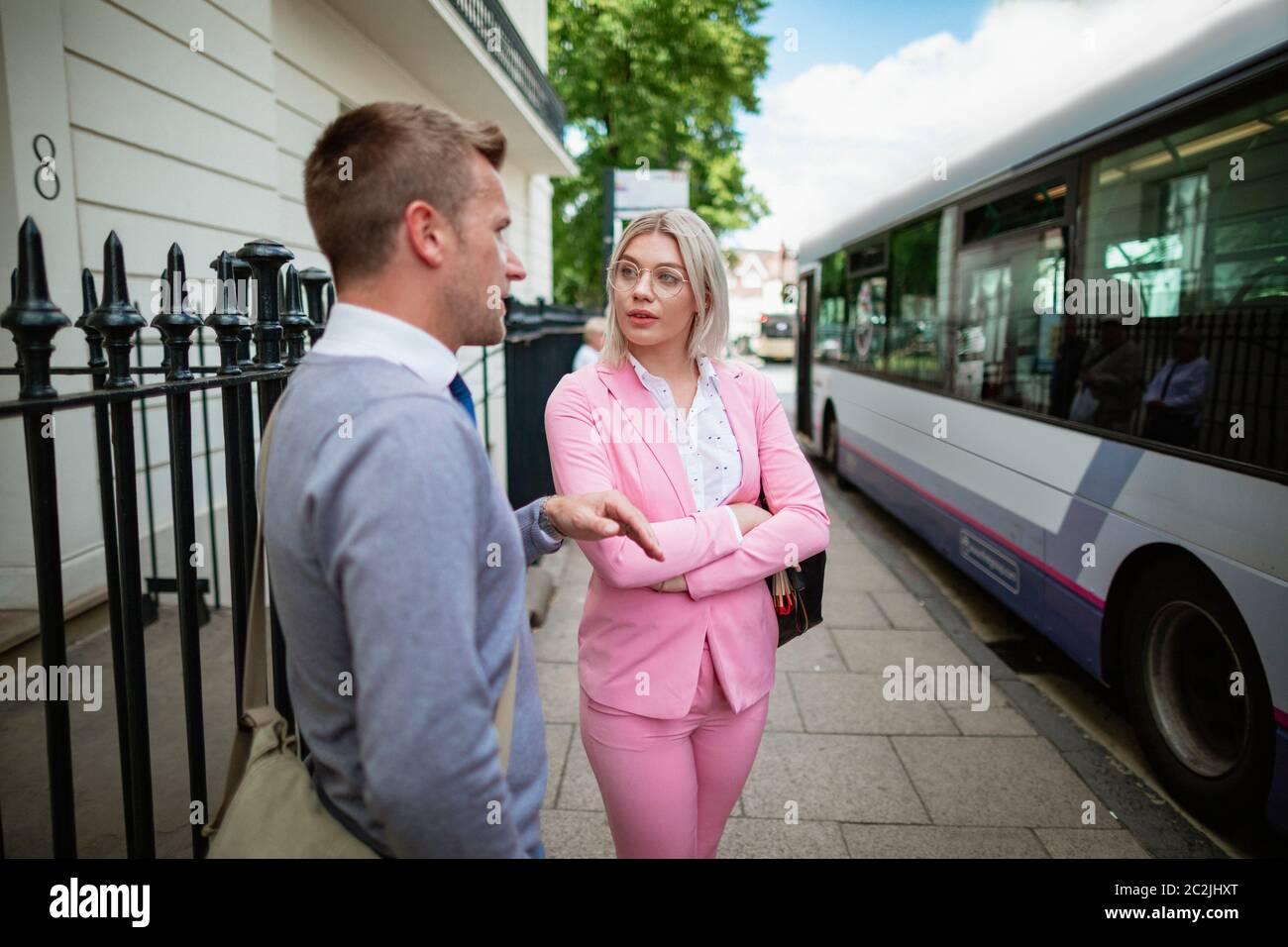 Females waiting for bus hi-res stock photography and images - Alamy