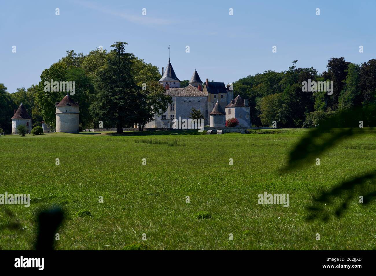 A view across the grounds to Brede castle (Chateau de la Brede) in the ...
