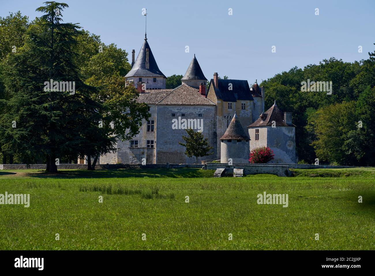 A view across the grounds to Brede castle (Chateau de la Brede) in the ...