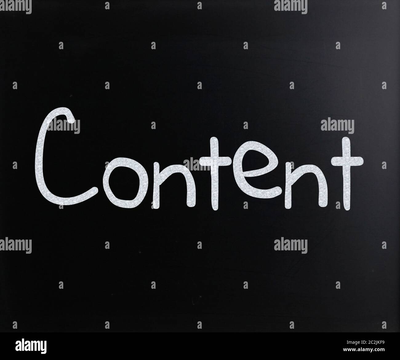 The word "Content" handwritten with white chalk on a blackboard Stock ...