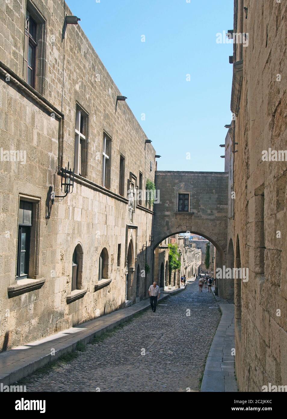 people on the street of the knights of rhodes lined with medieval ...