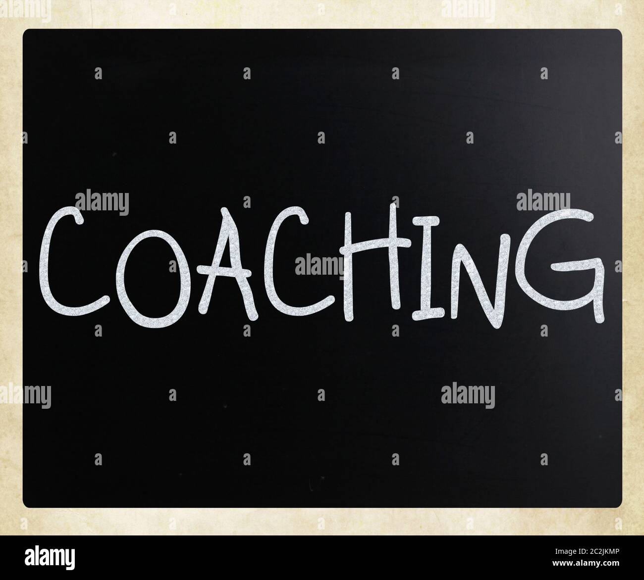 "Coaching" handwritten with white chalk on a blackboard Stock Photo - Alamy