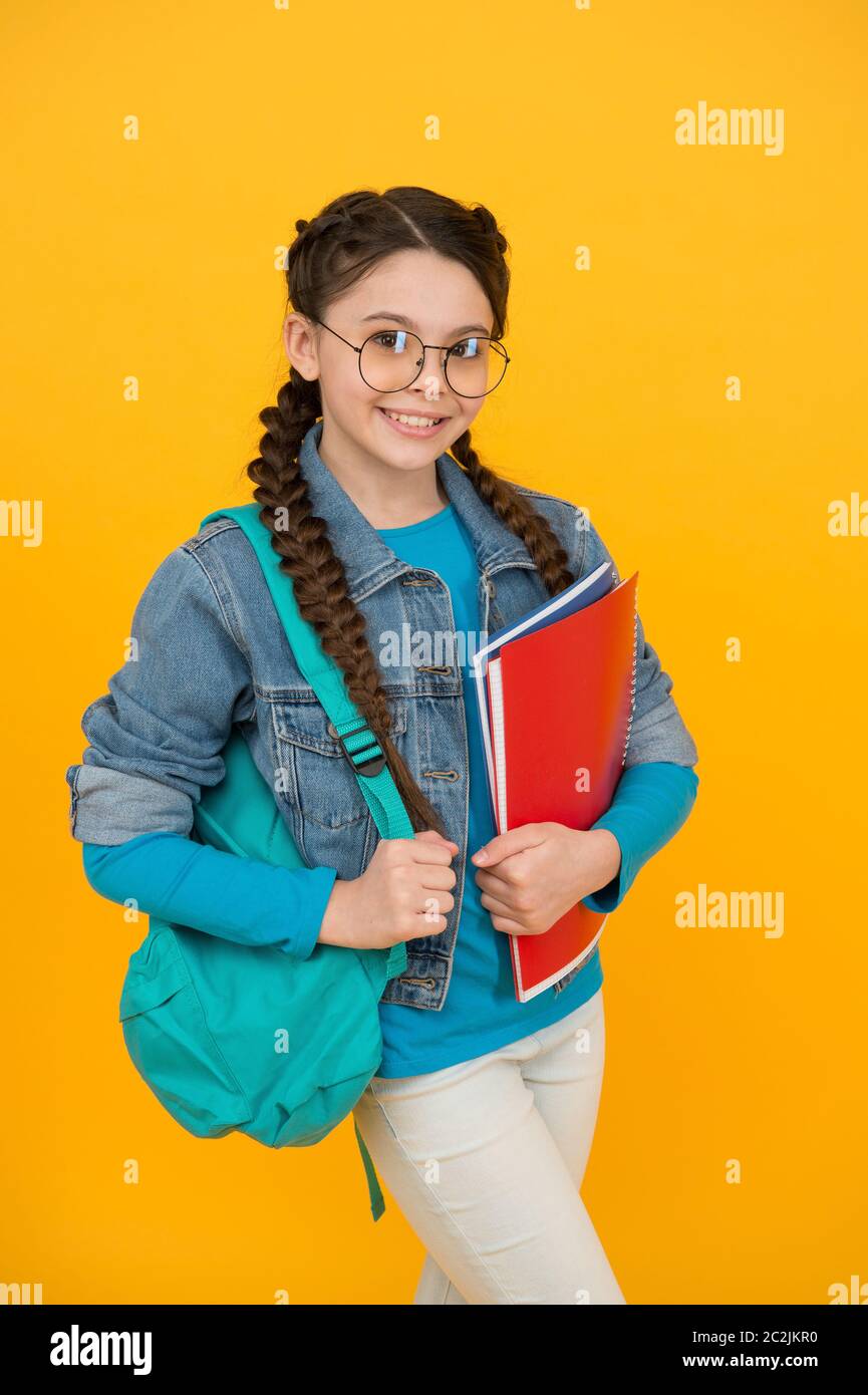 My study routine. Happy child back to school. Small girl hold books ...