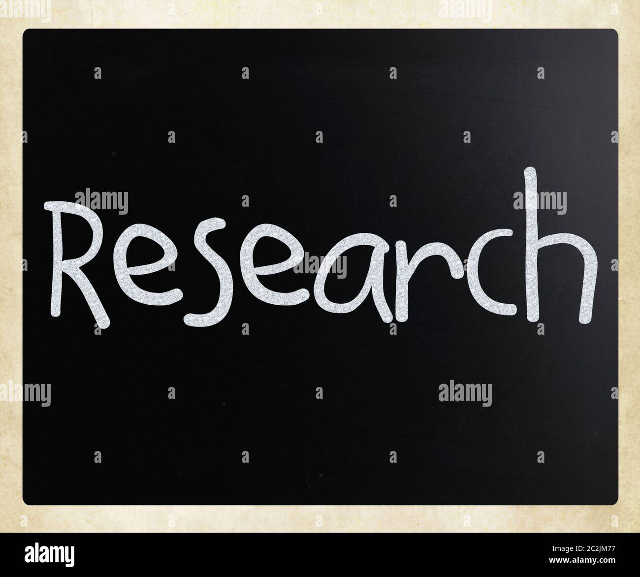 "Research" handwritten with white chalk on a blackboard Stock Photo - Alamy