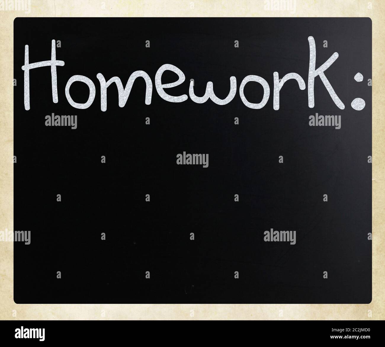 "Homework" handwritten with white chalk on a blackboard Stock Photo - Alamy