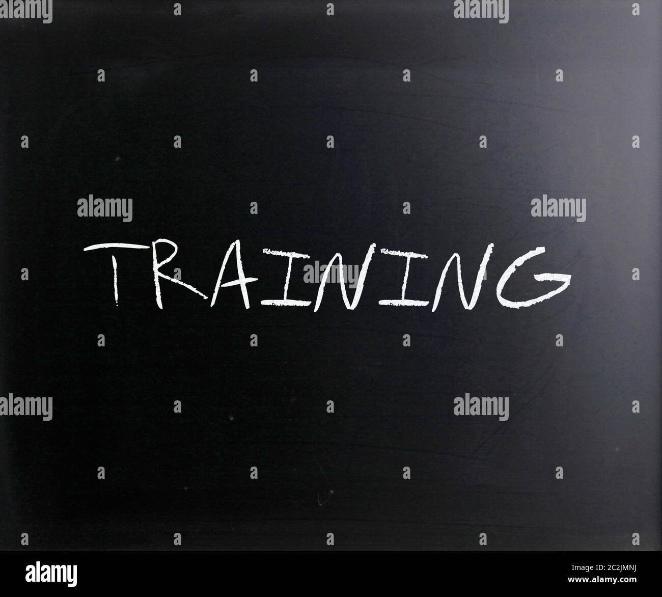 "Training" handwritten with white chalk on a blackboard Stock Photo - Alamy